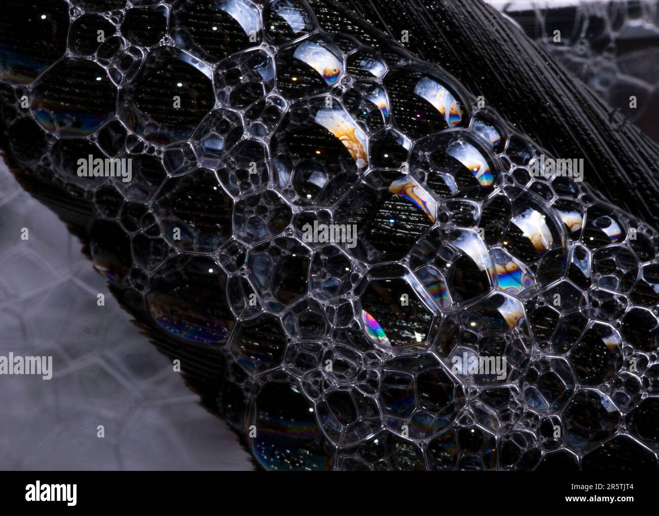 A grayscale of soap bubbles isolated on dark background Stock Photo - Alamy