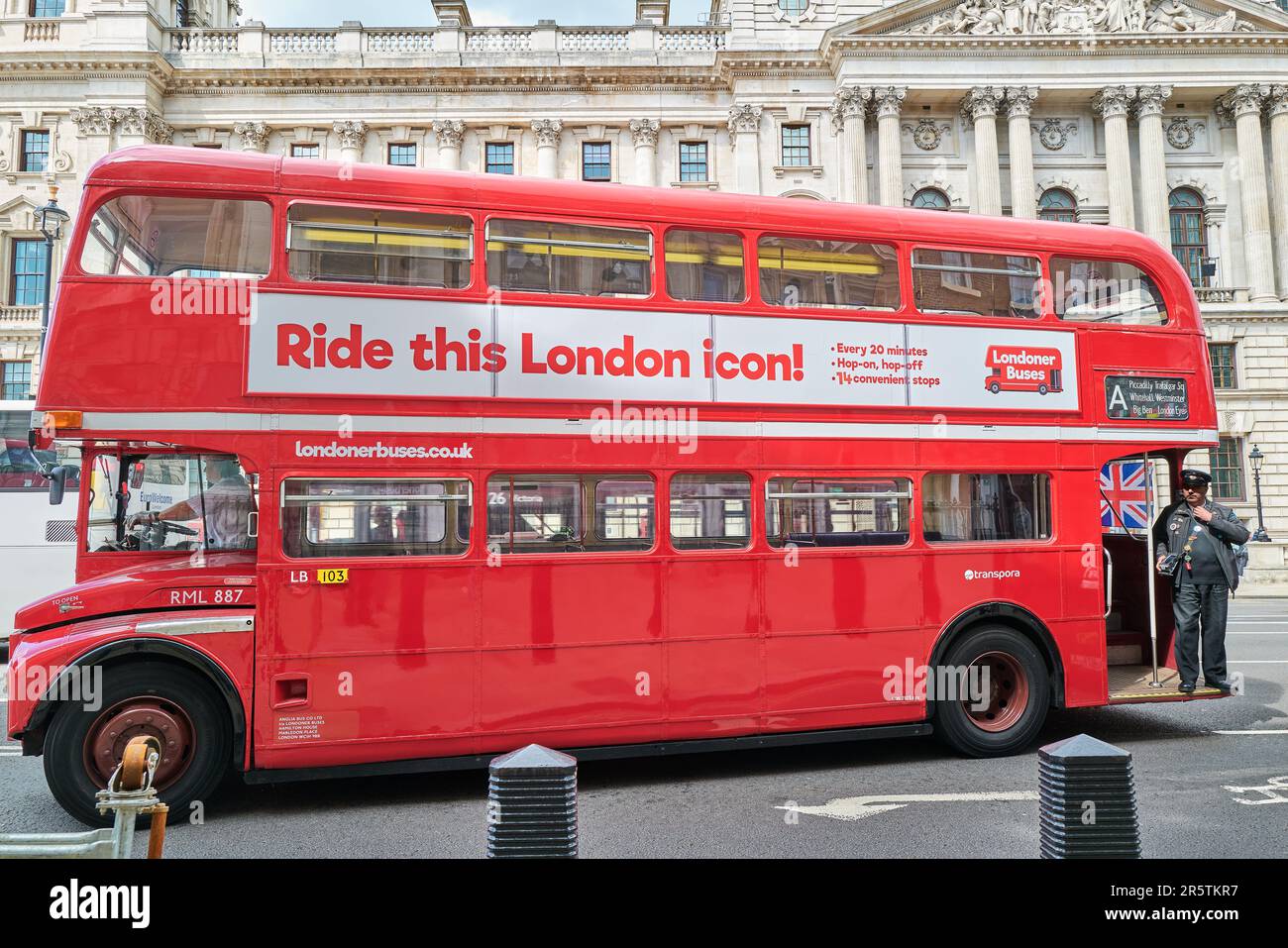 Old fashioned red double decker bus on Parliament Street, London ...