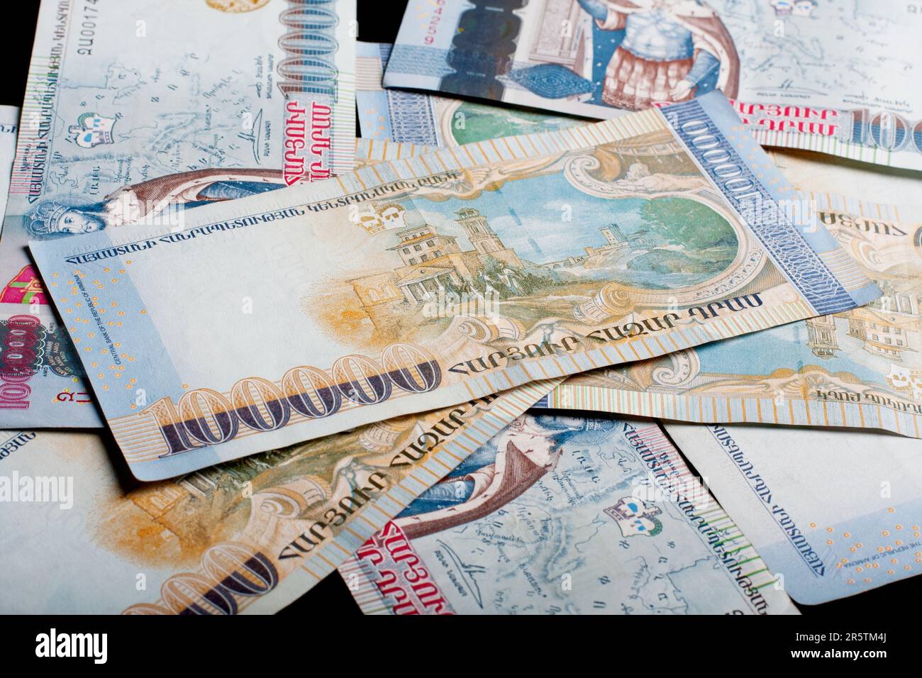 An array of five different banknotes with vivid colors and images ...