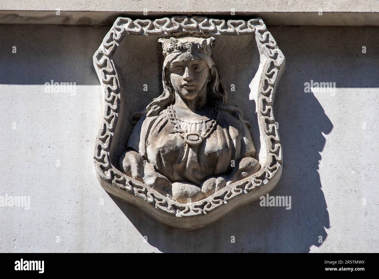 Close-up of a relief sculpture of a Royal-looking person on the ...