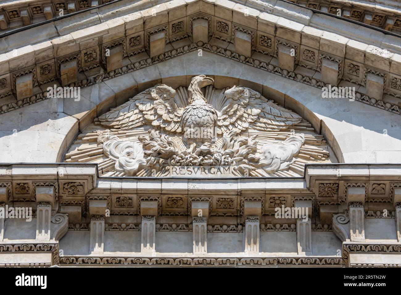 Stone relief carving of a Phoenix on the exterior of St. Pauls ...