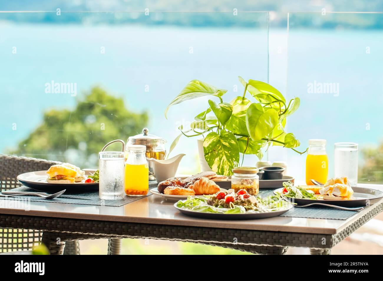 Outdoor healthy breakfast for two with a sea view Stock Photo - Alamy