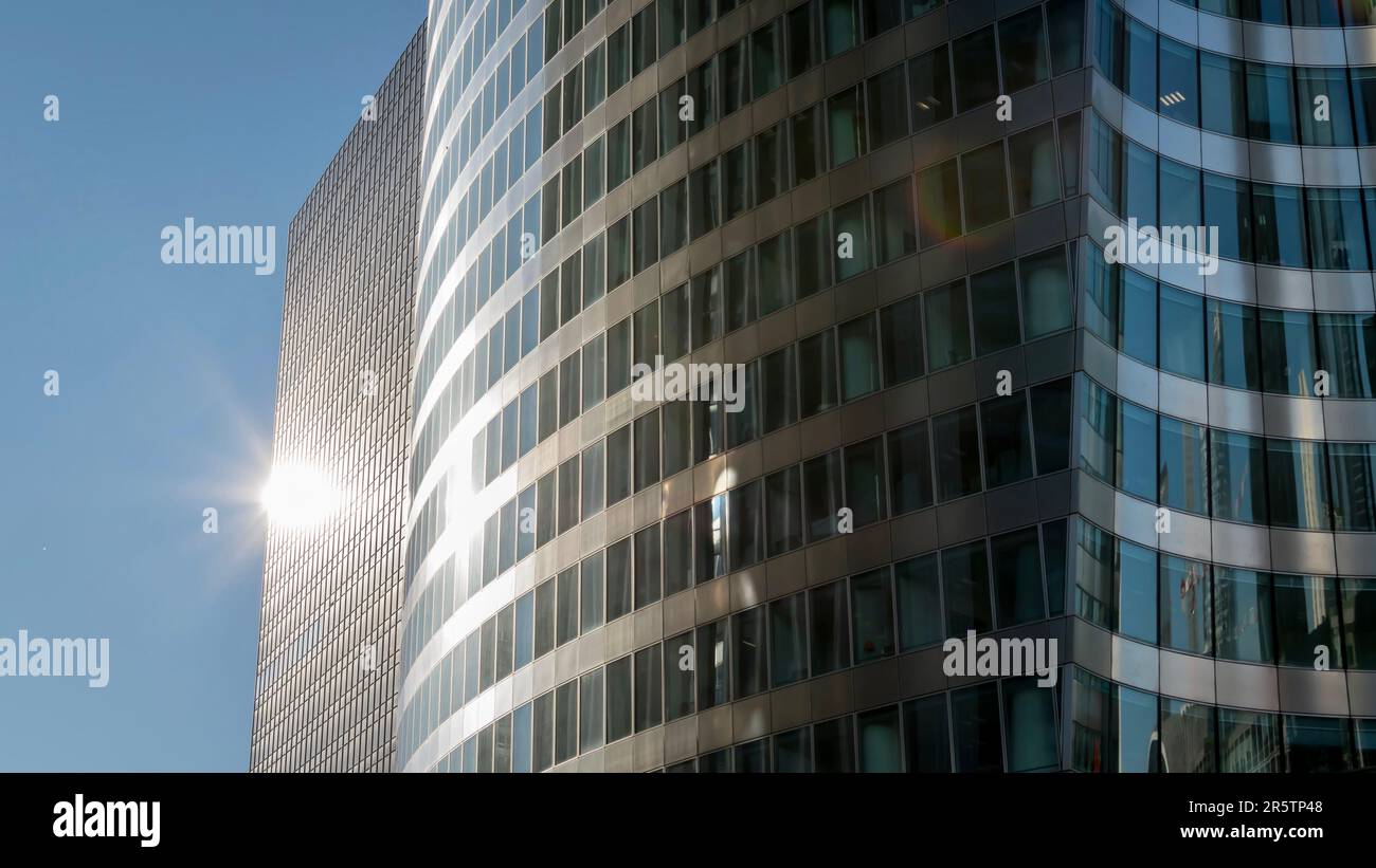 A high-rise building illuminated by the bright sunlight Stock Photo - Alamy