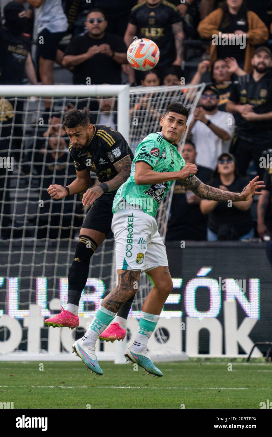 LAFC forward Denis Bouanga (99) wins a header against Club León ...