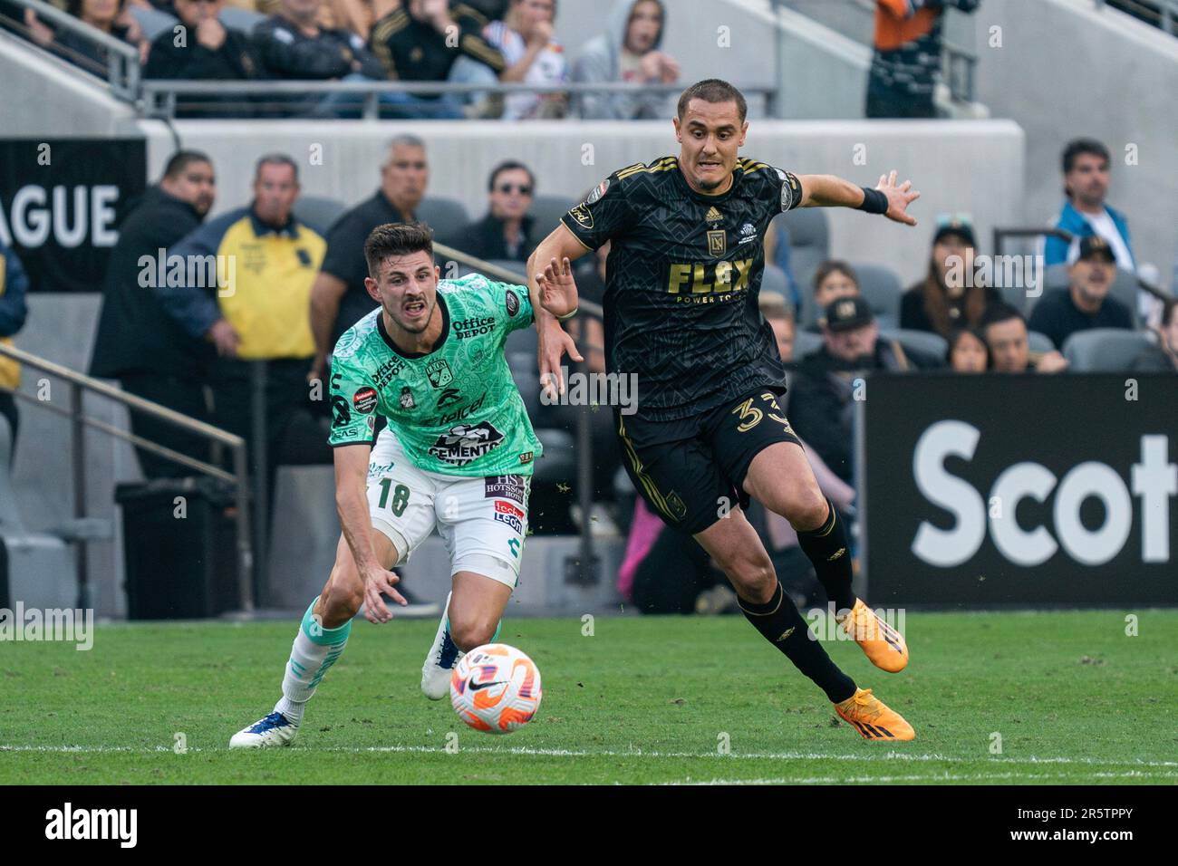 LAFC defender Aaron Long (33) and Club León forward Lucas Di Yorio (18 ...