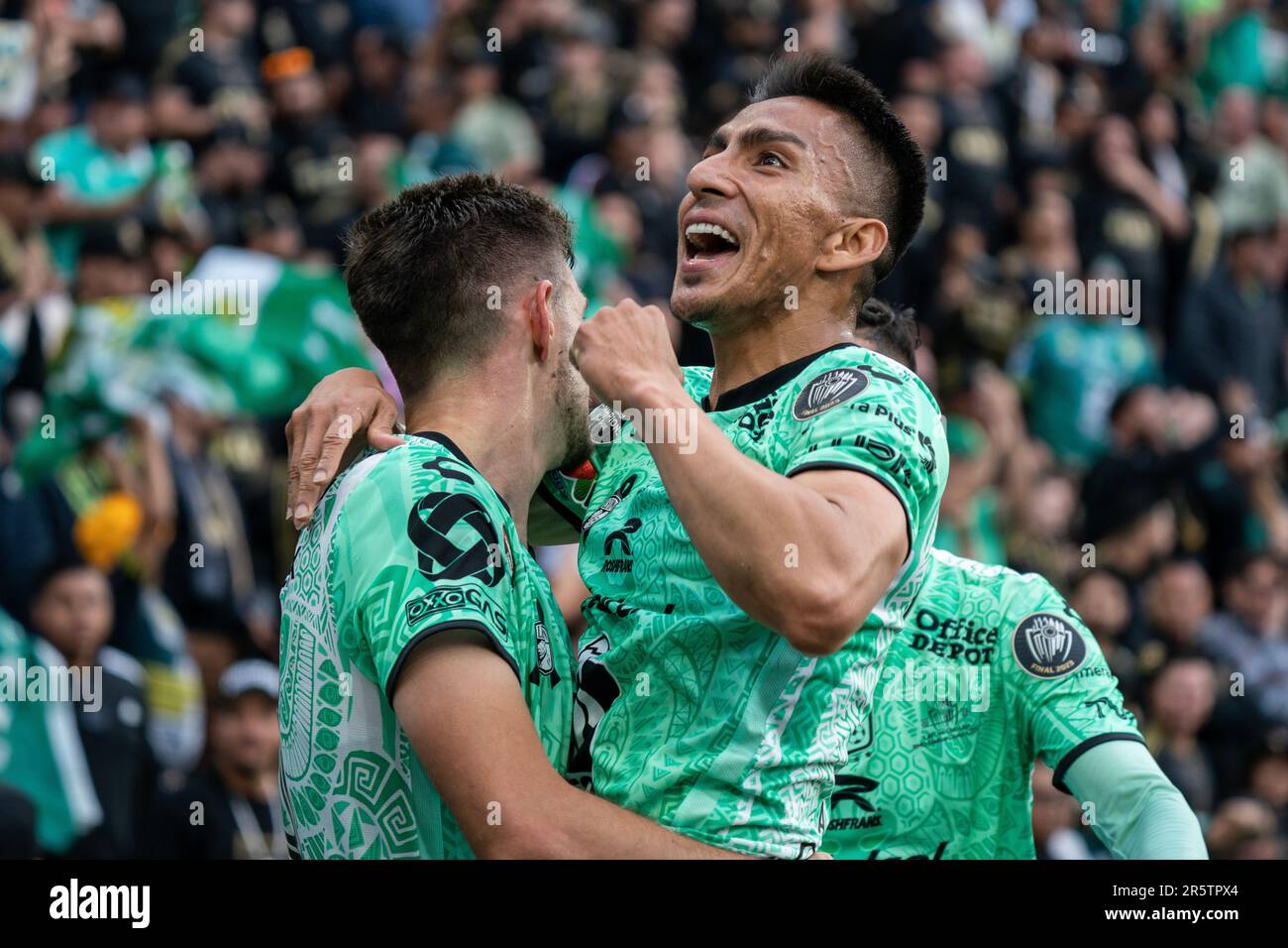 Club León midfielder Ángel Mena (13) celebrates a goal by Club León ...