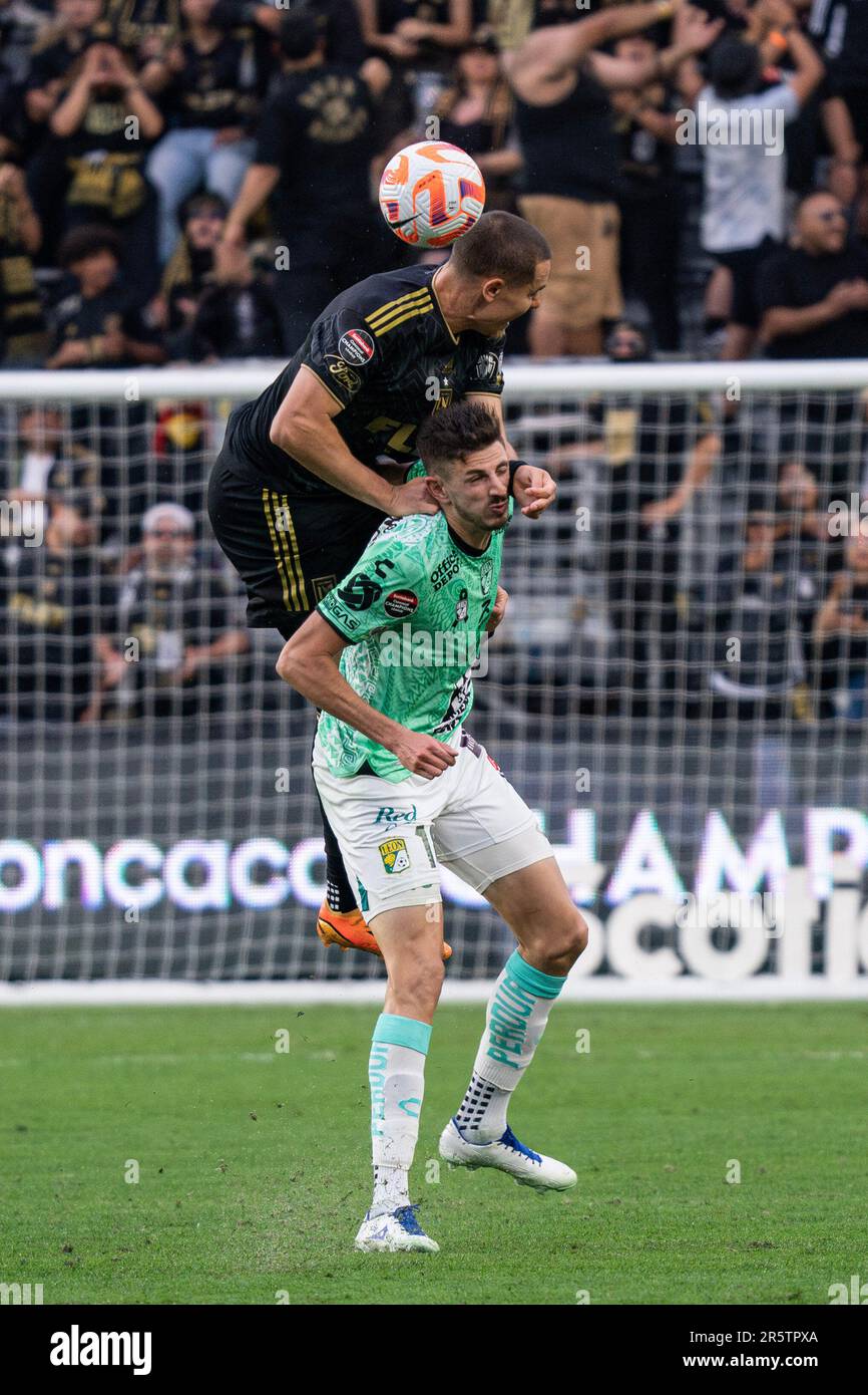 LAFC defender Aaron Long (33) wins a header against Club León forward ...
