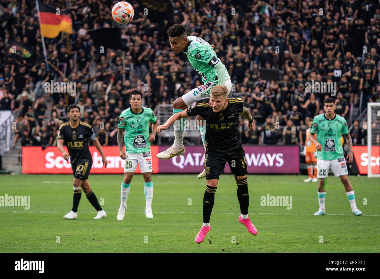 Club León defender William Tesillo (6) wins a header over LAFC ...