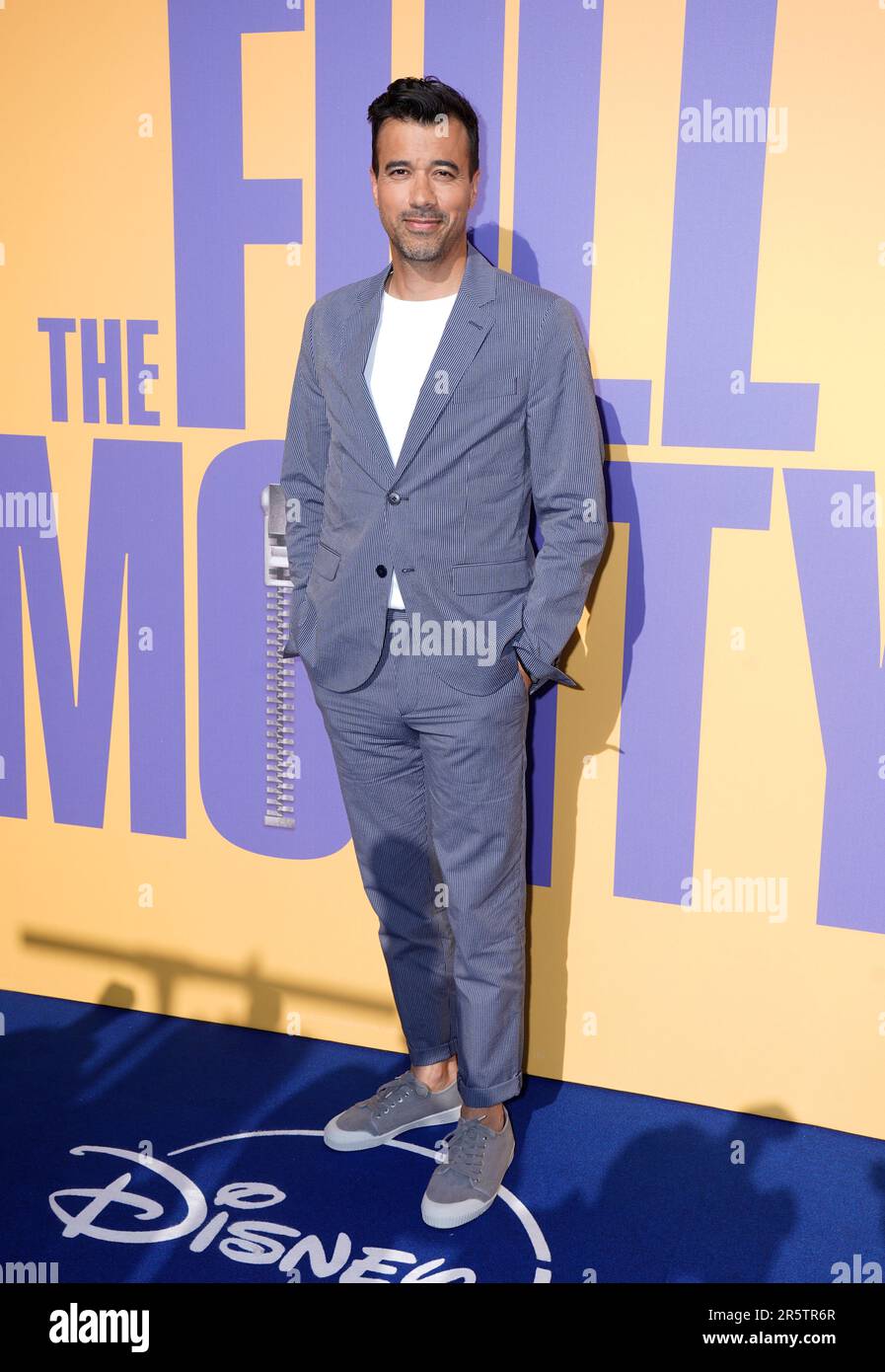 Phillip Rhys Chaudhary attending the UK premiere for The Full Monty at ...