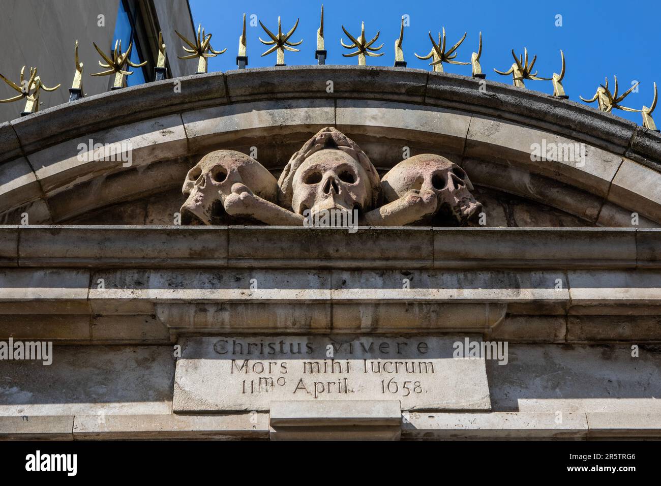 The skull and crossbones stone sculpture above the gateway into the ...