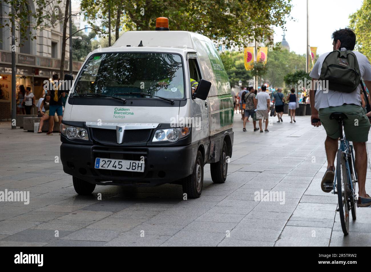 The minivan Piaggio Porter driving through Barcelona, Spain Stock Photo ...