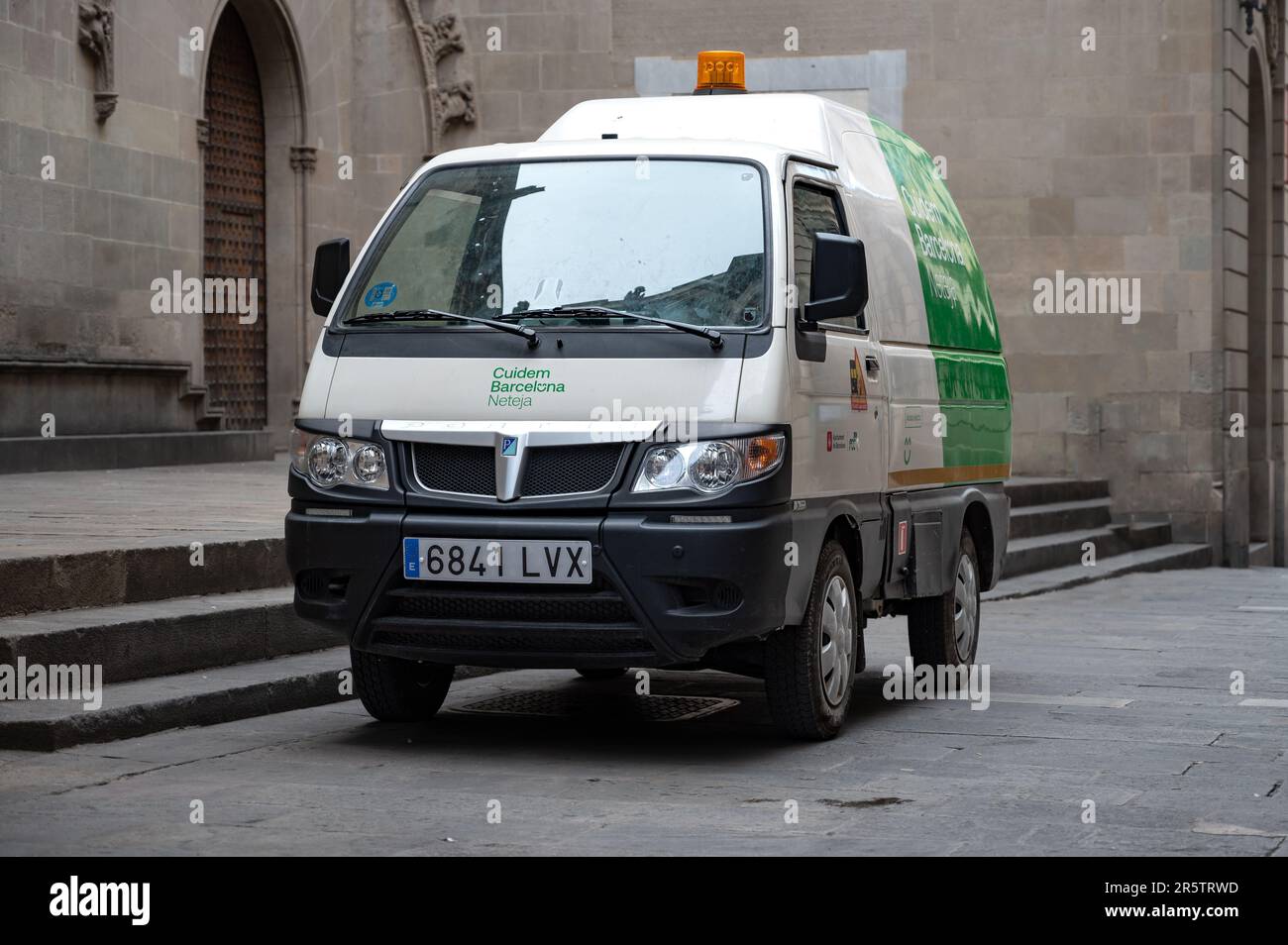 The minivan Piaggio Porter driving through Barcelona, Spain Stock Photo ...