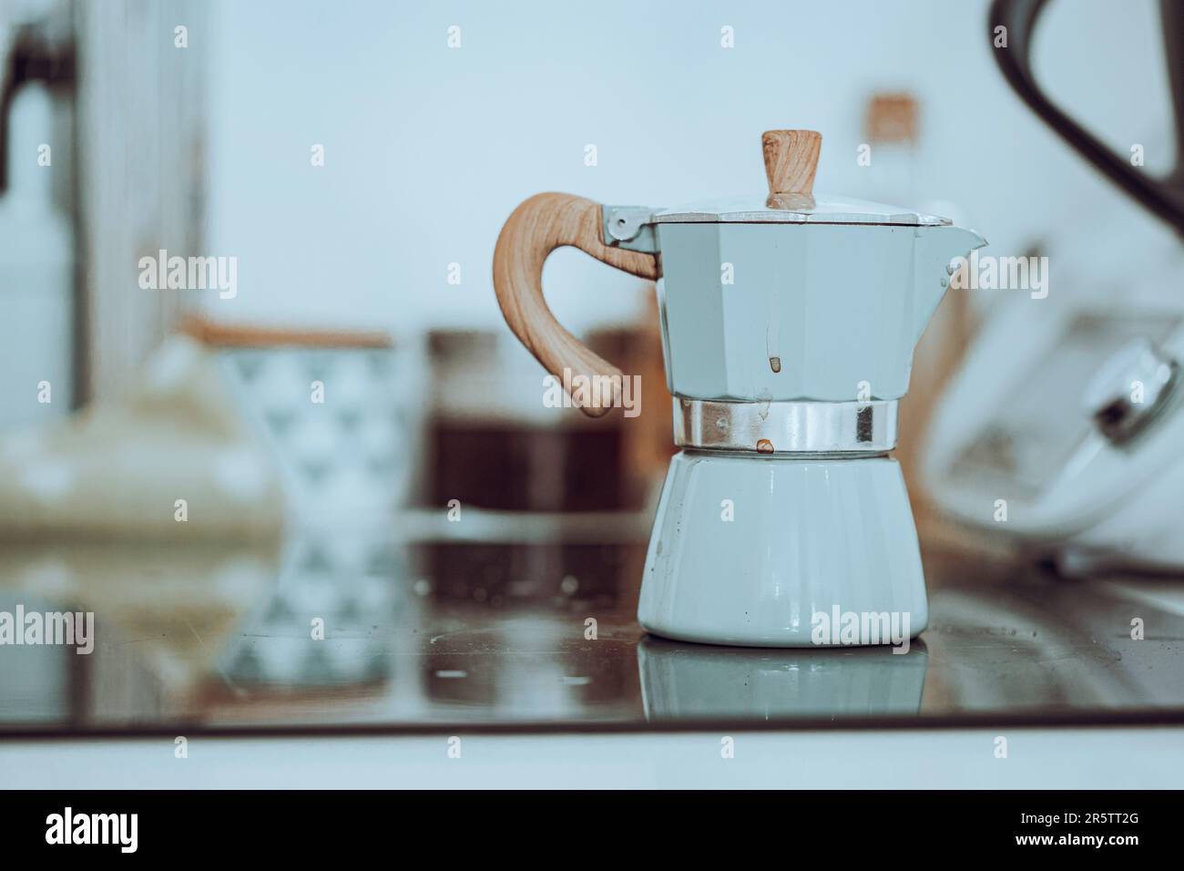 Old espresso coffee machine on a domestic kitchen Stock Photo - Alamy