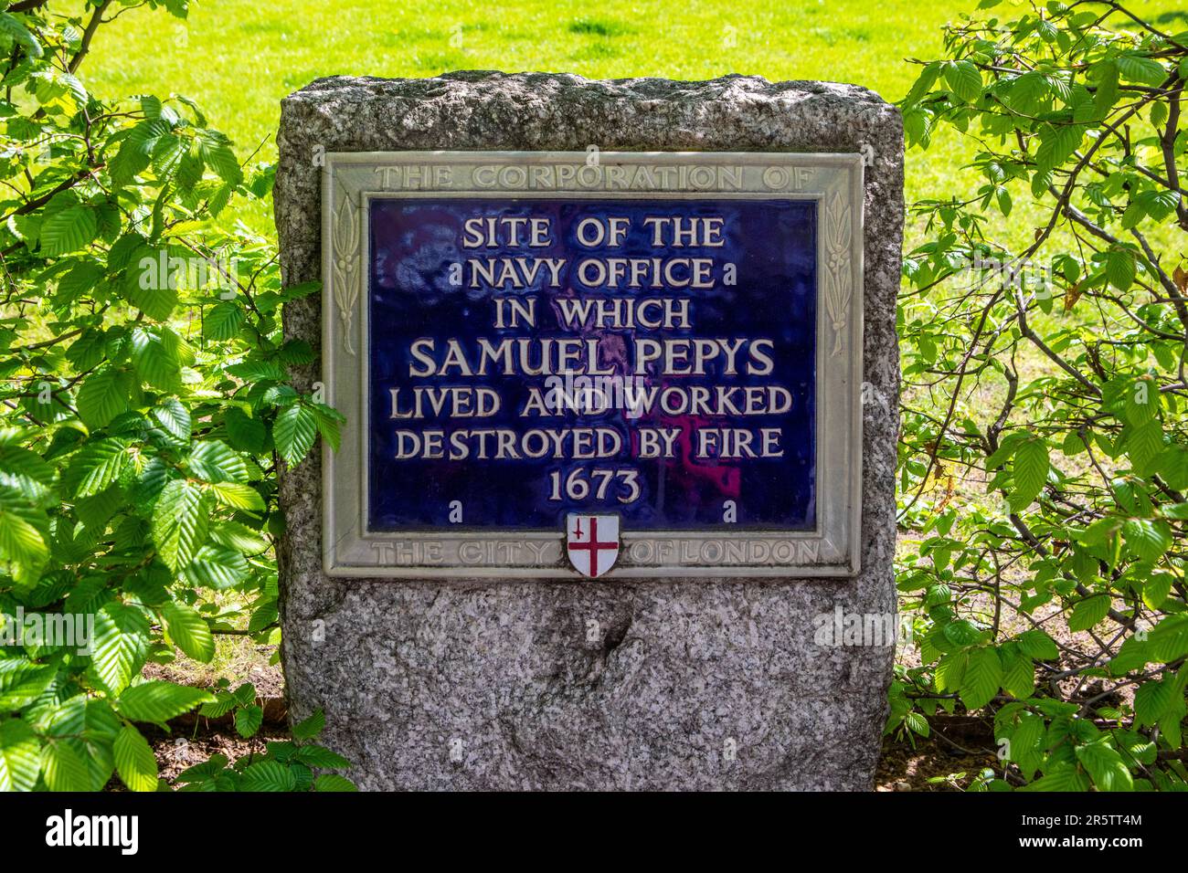 London, UK - April 17th 2023: A blue plaque located in a garden on ...