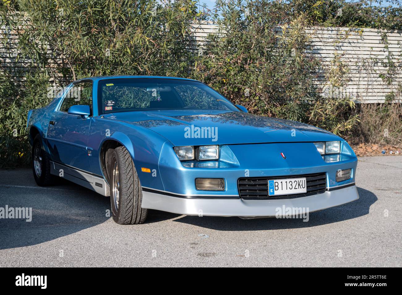 A closeup of a blue third-generation Chevrolet Camaro 5.0 classic ...