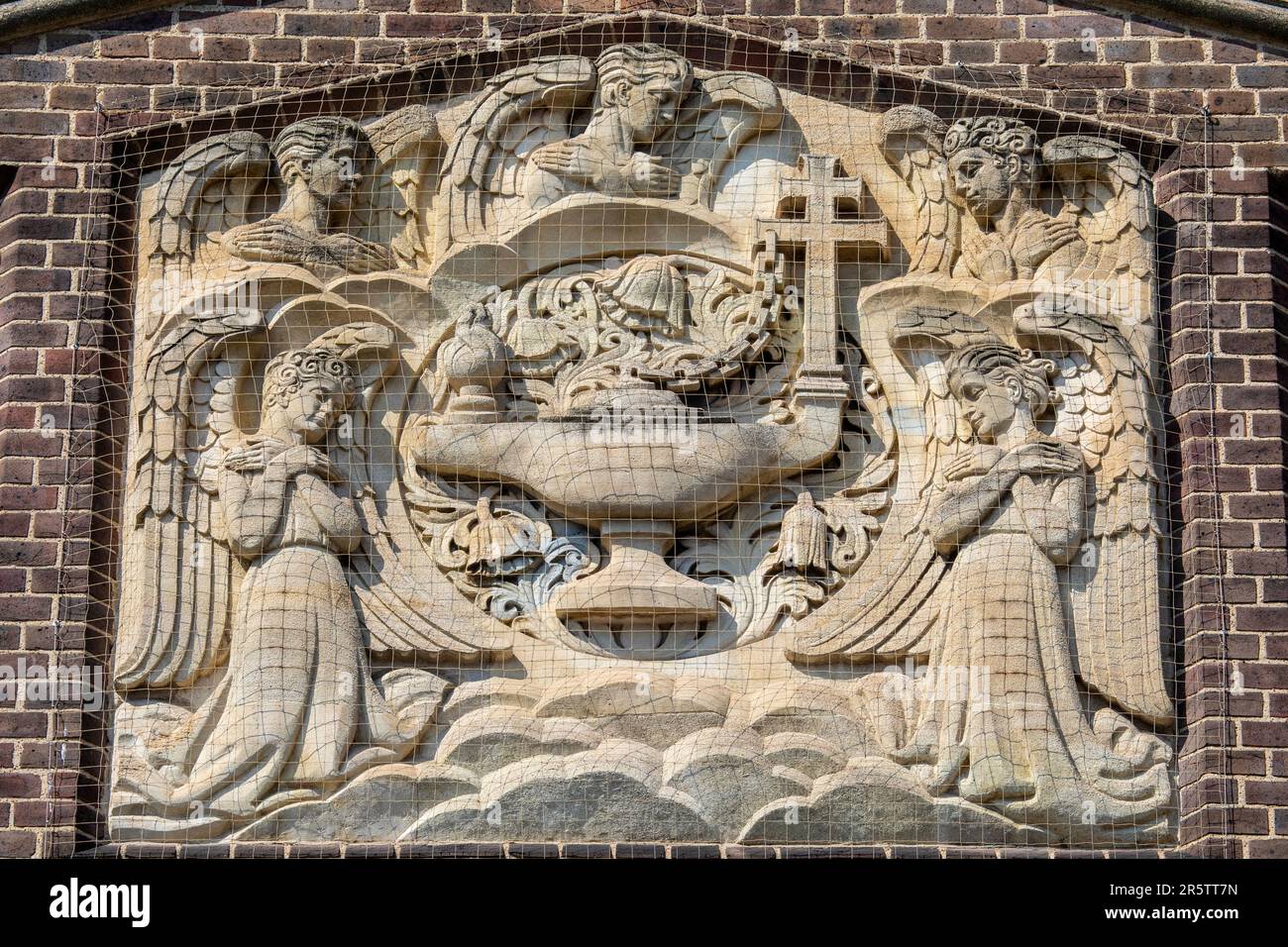 London, UK - April 17th 2023: Stone relief sculpture on the exterior of ...