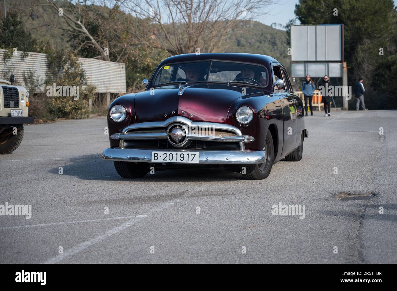 The front view of a classic American car, of the '49 bullet nose Ford ...