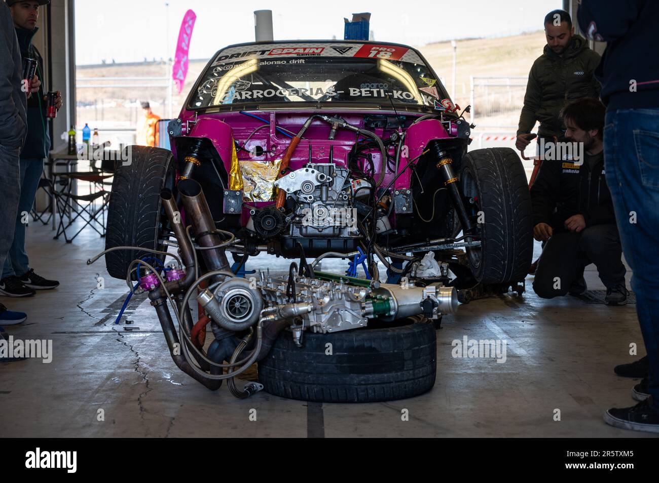 Detail of a BMW E30 prepared for drift competition, they are changing ...