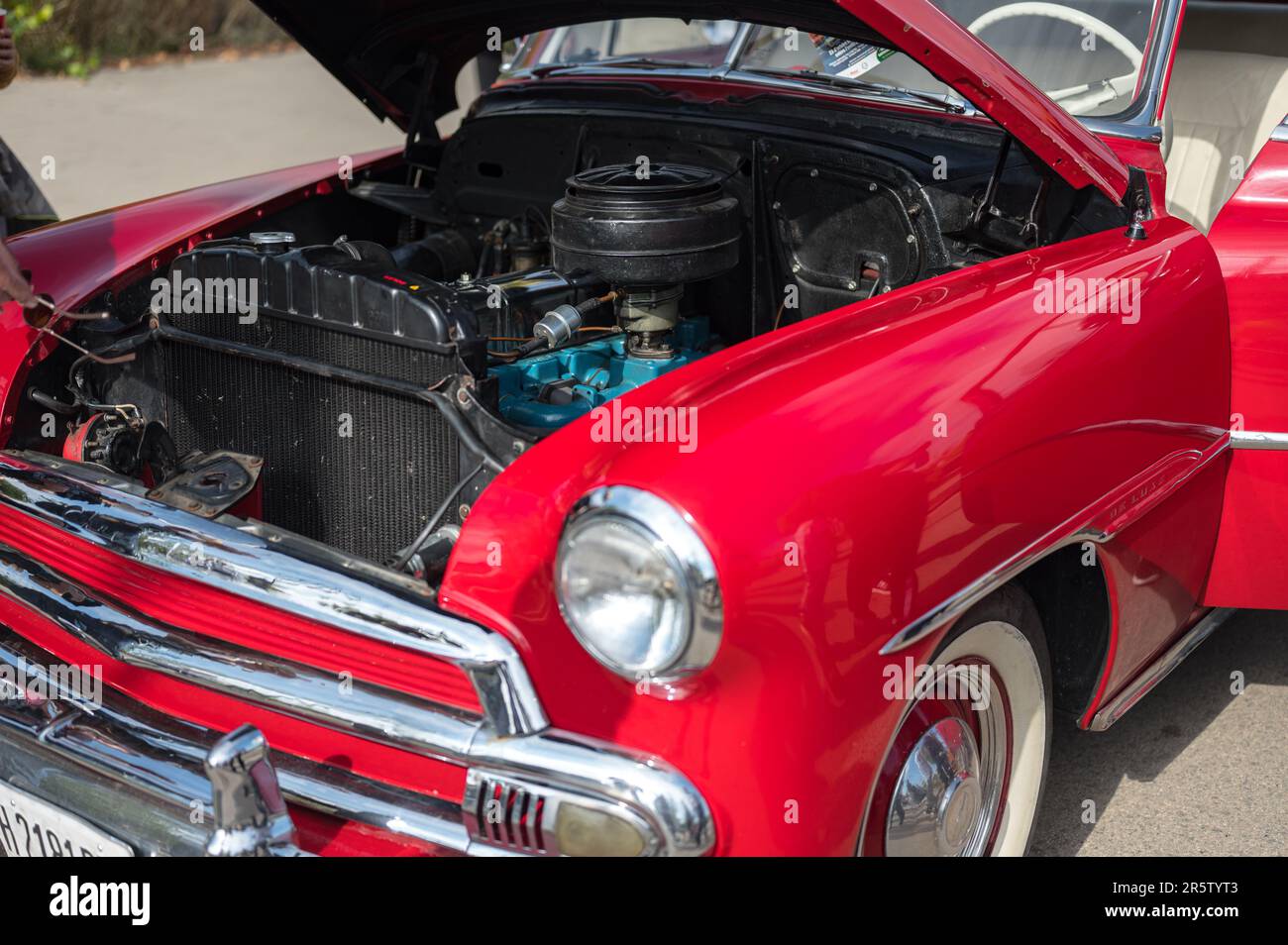 Detail of the large carburetion engine of a classic and historical ...