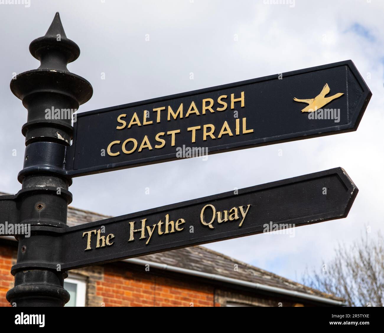 Close-up of signposts showing the direction of the Saltmarsh Coast ...