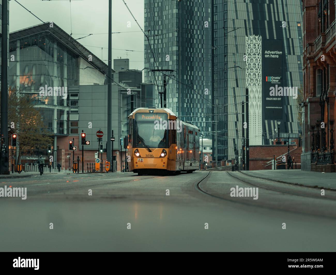 Yellow tram manchester hi-res stock photography and images - Alamy