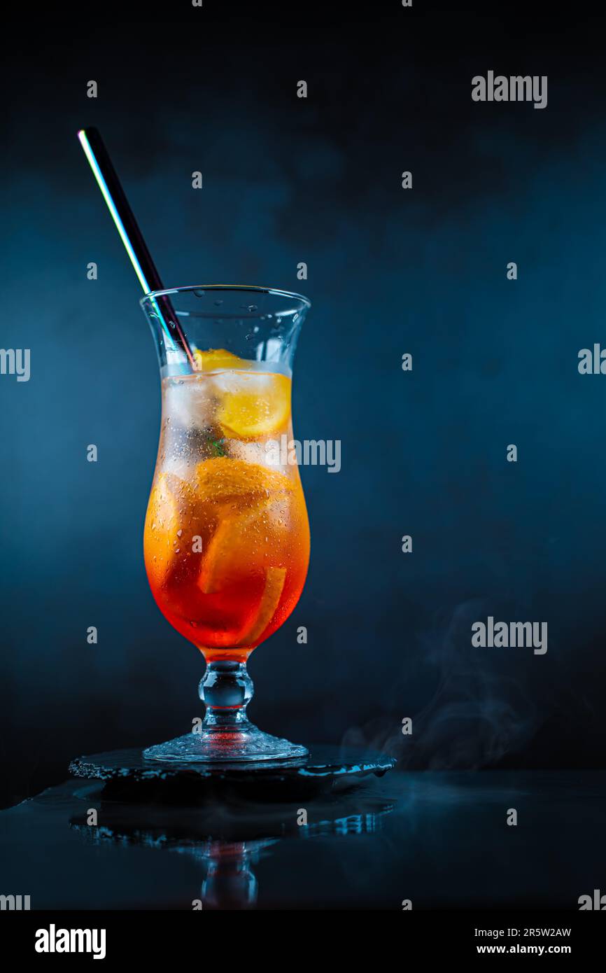 A glass of sparkling Aperol Spritz on a dark isolated background Stock ...