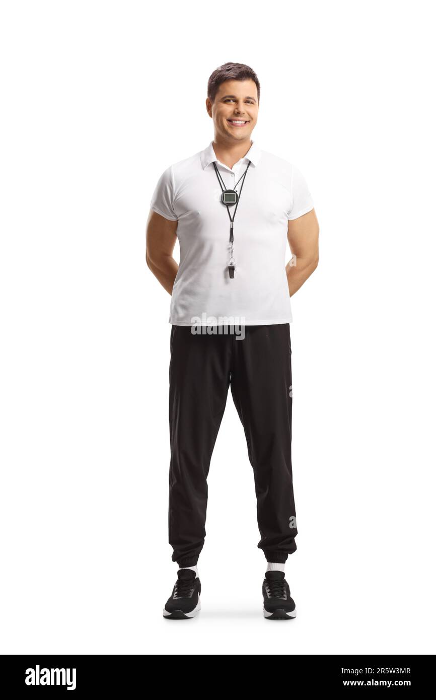 Full length portrait of a sports coach with a whistle posing and ...