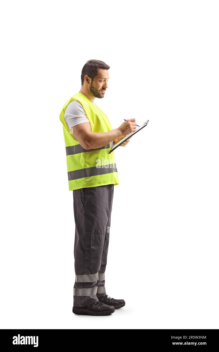 Road assistance worker in a reflective vest writing a document isolated ...