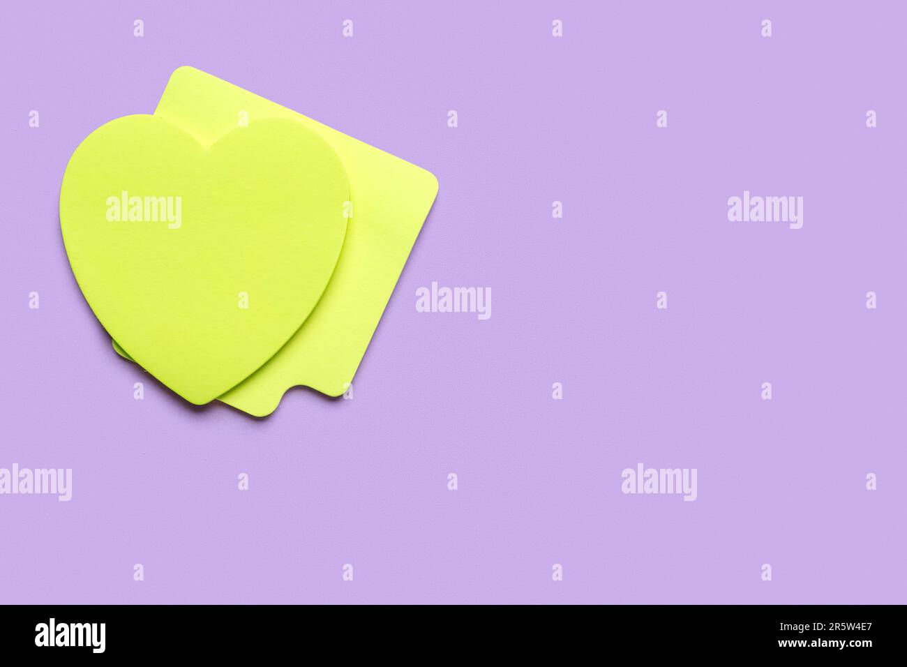 Sticky notes on violet background. Update concept Stock Photo - Alamy