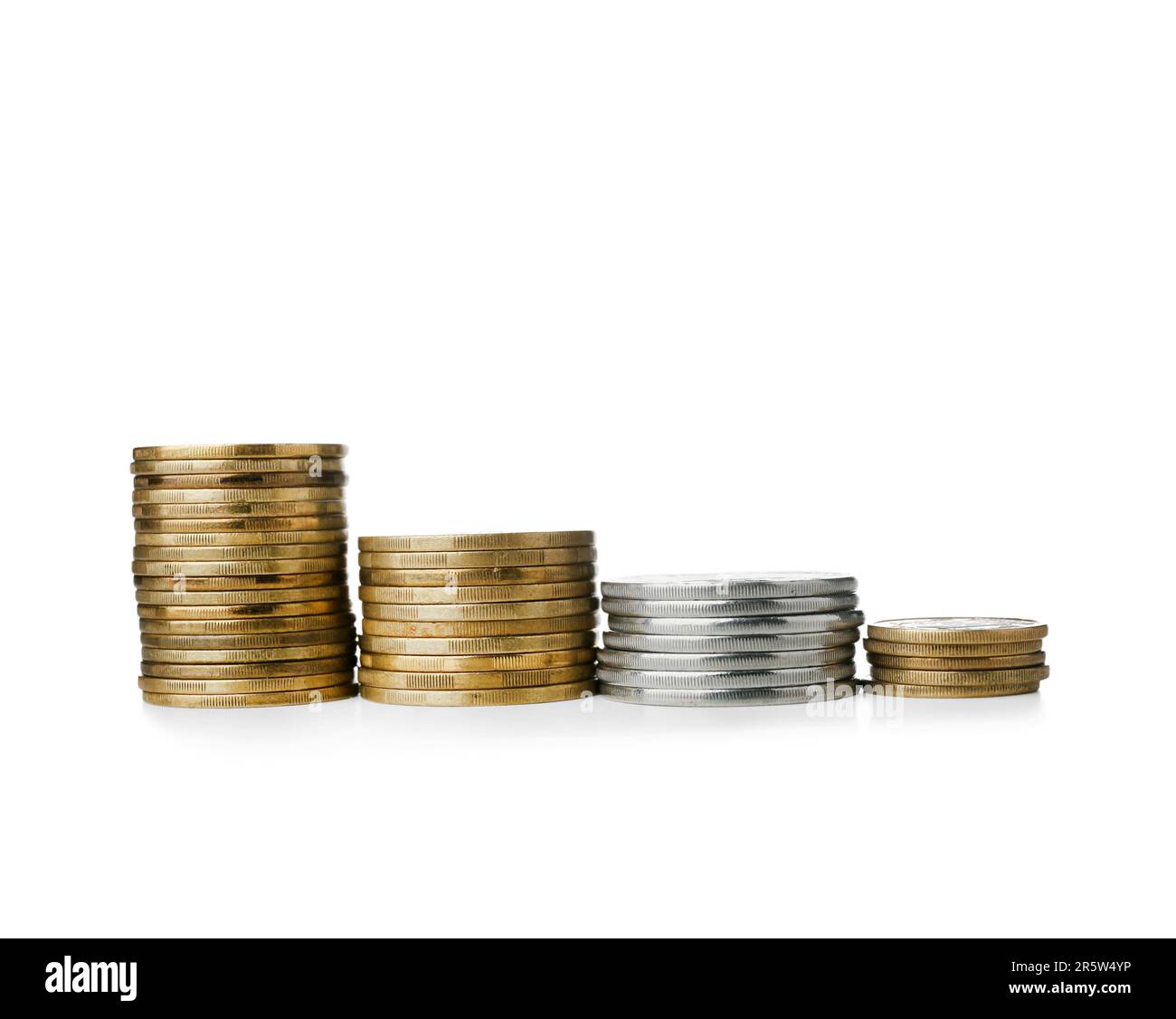 Stacks of coins isolated on white background Stock Photo - Alamy