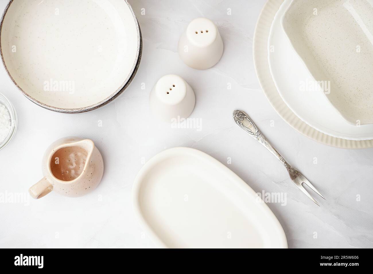 Set of stylish tableware on white background Stock Photo - Alamy