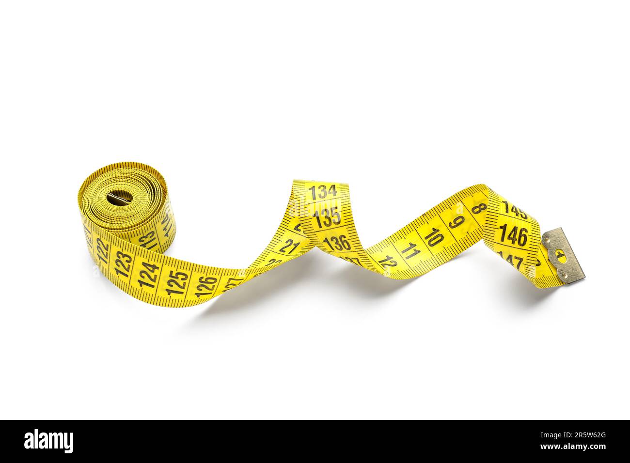 Yellow tape measure on white background Stock Photo - Alamy