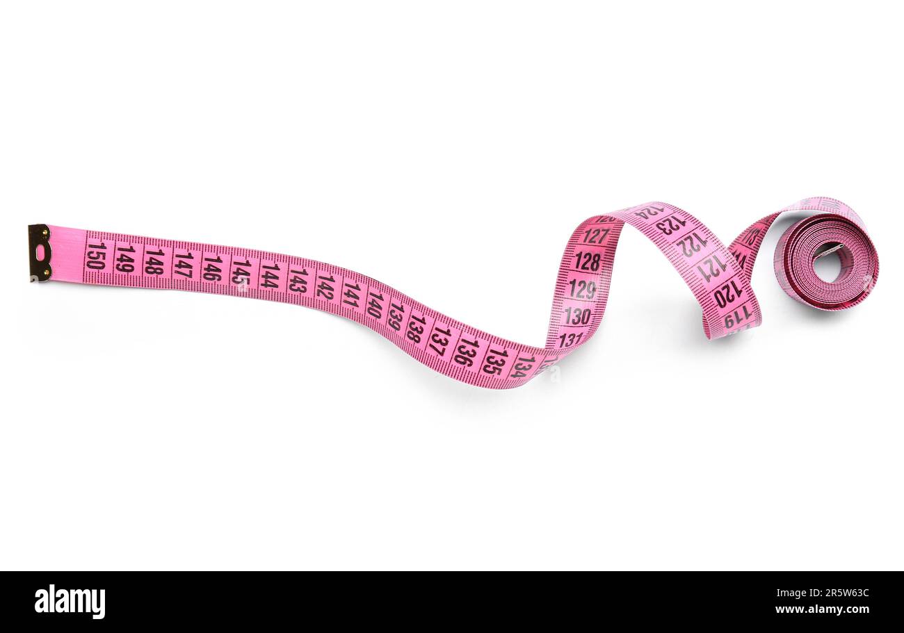 Pink tape measure on white background Stock Photo - Alamy