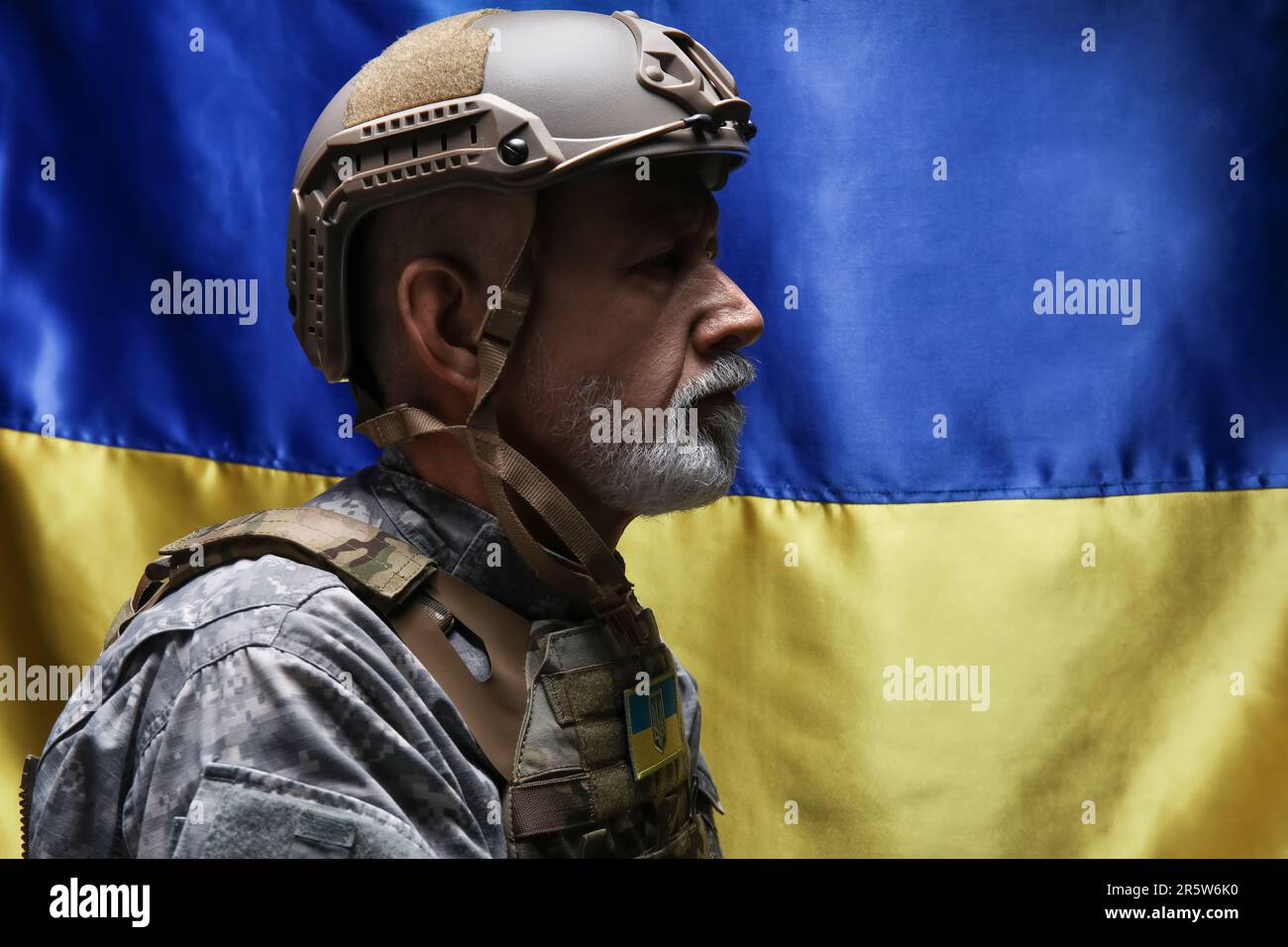Mature soldier against flag hi-res stock photography and images - Alamy