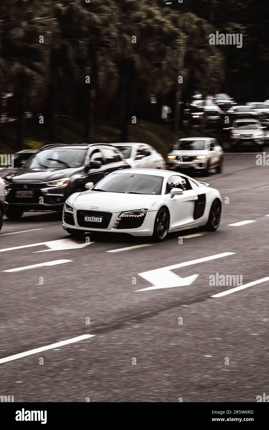 A white Audi R8 on a dark street with blurred background Stock Photo ...