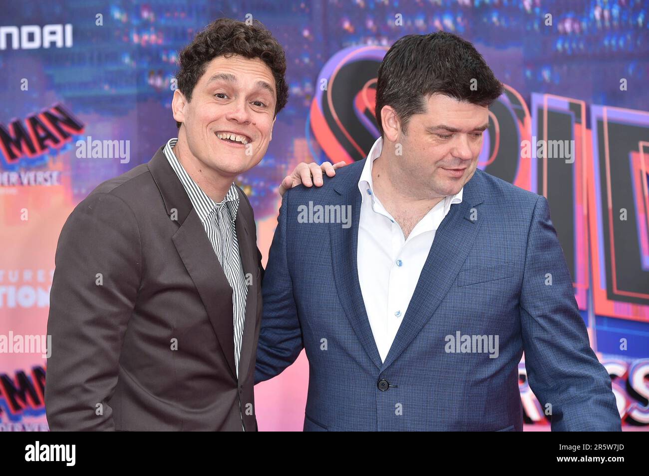 Phil Lord and Christopher Miller arrive at the world premiere of "Spider-Man: Across The Spider ...