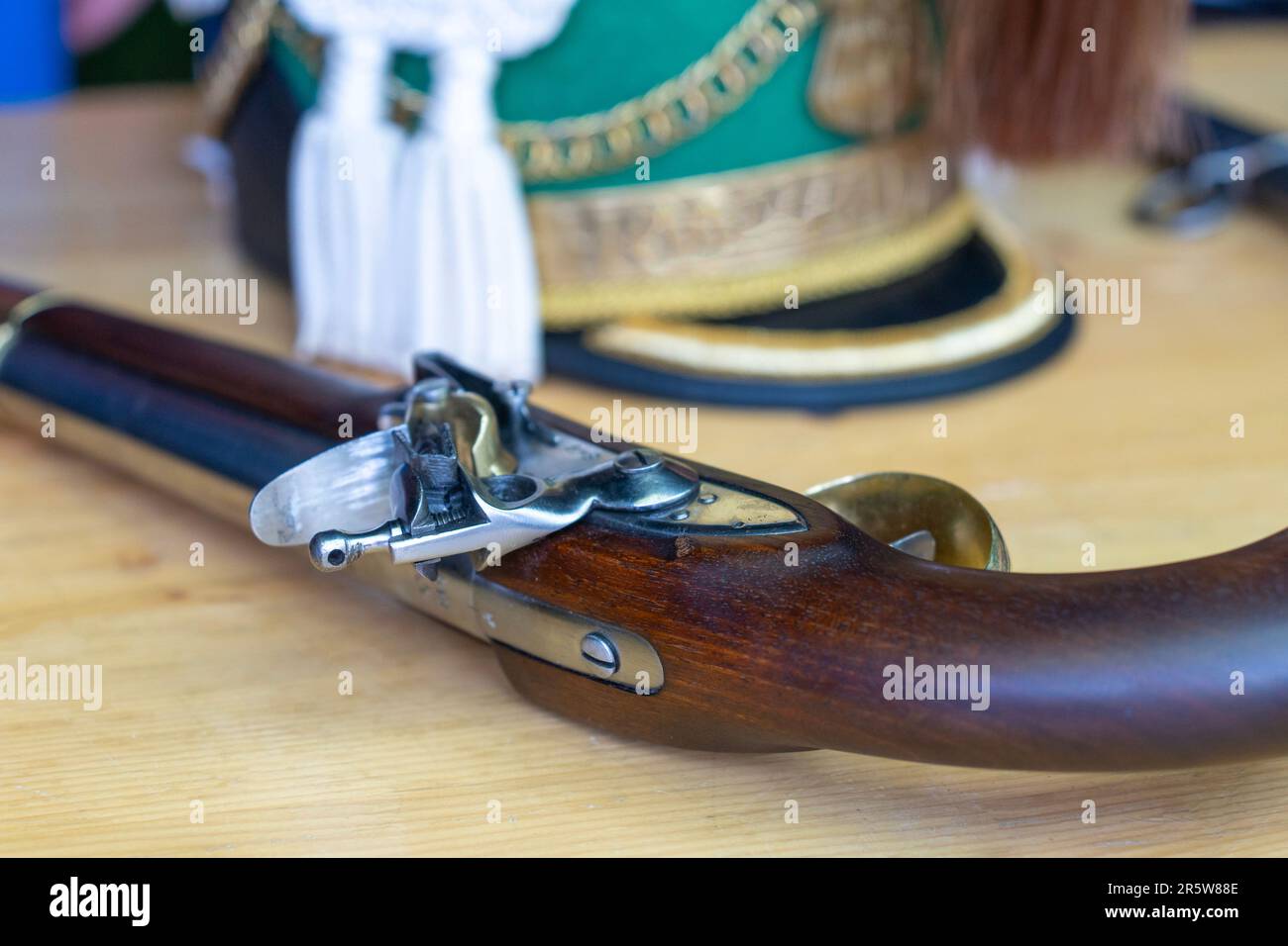 The firing mechanism of a 19th-century front-loading flintlock pistol ...