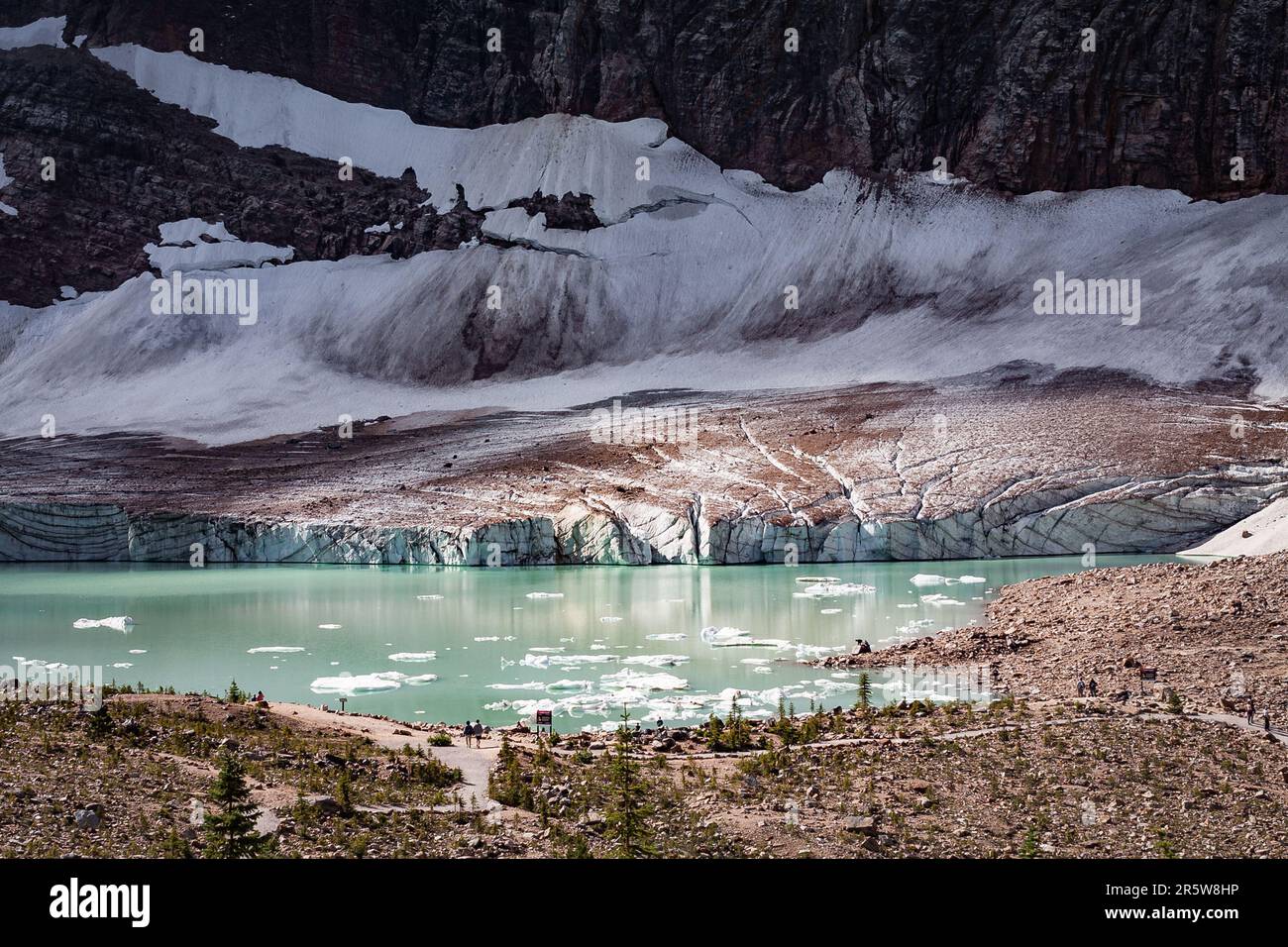 mountain landscape with snow flowing into the lake on the BANFF ...