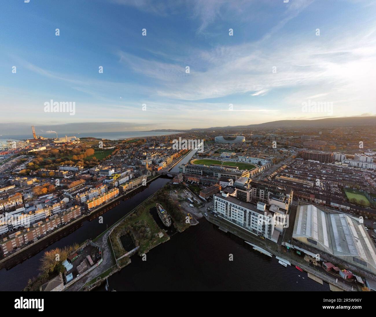 An aerial view of Dublin City with urban buildings and houses near ...