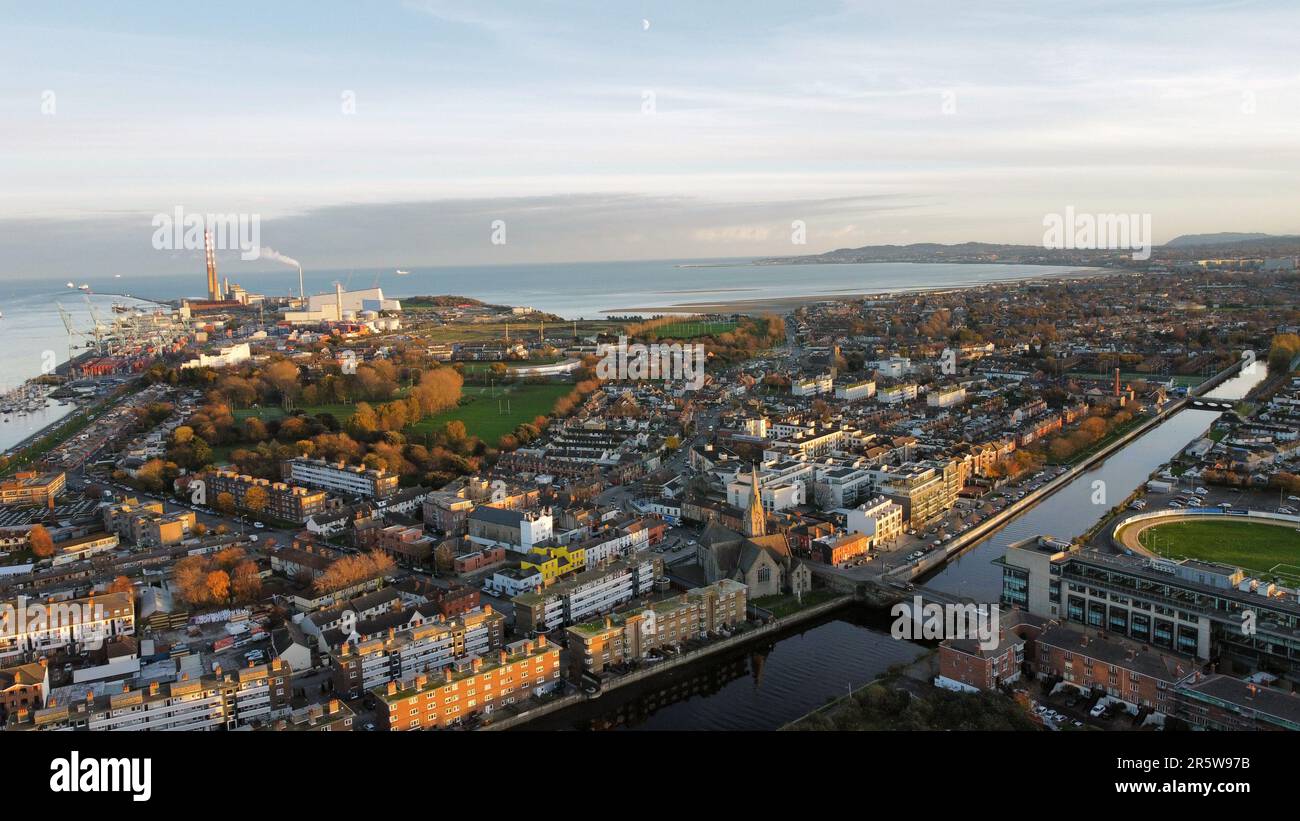 An aerial view of Dublin City with urban buildings and houses near ...