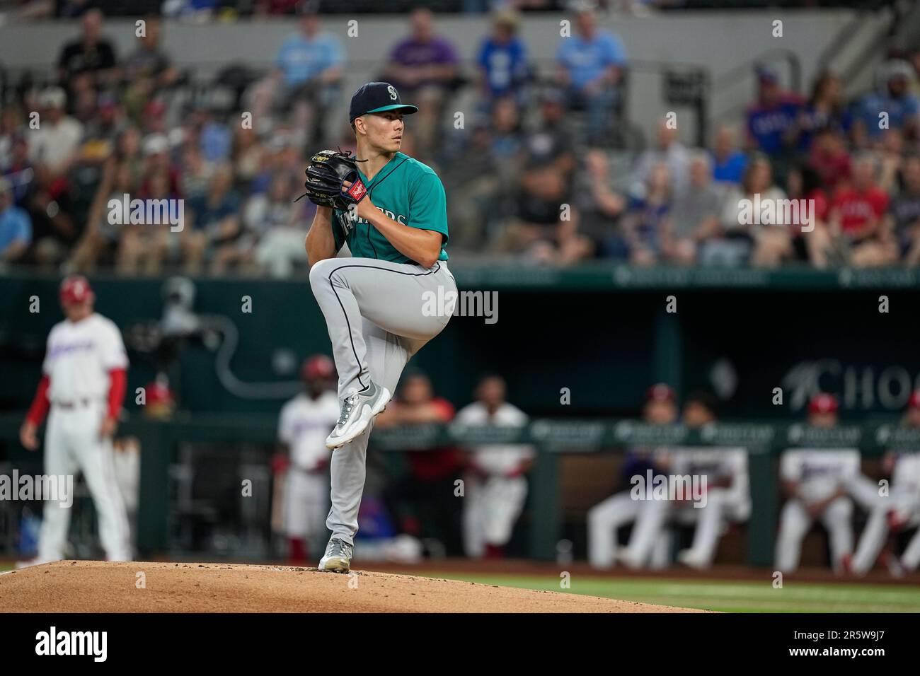 Seattle Mariners starting pitcher Bryan Woo winds up to throw to the ...