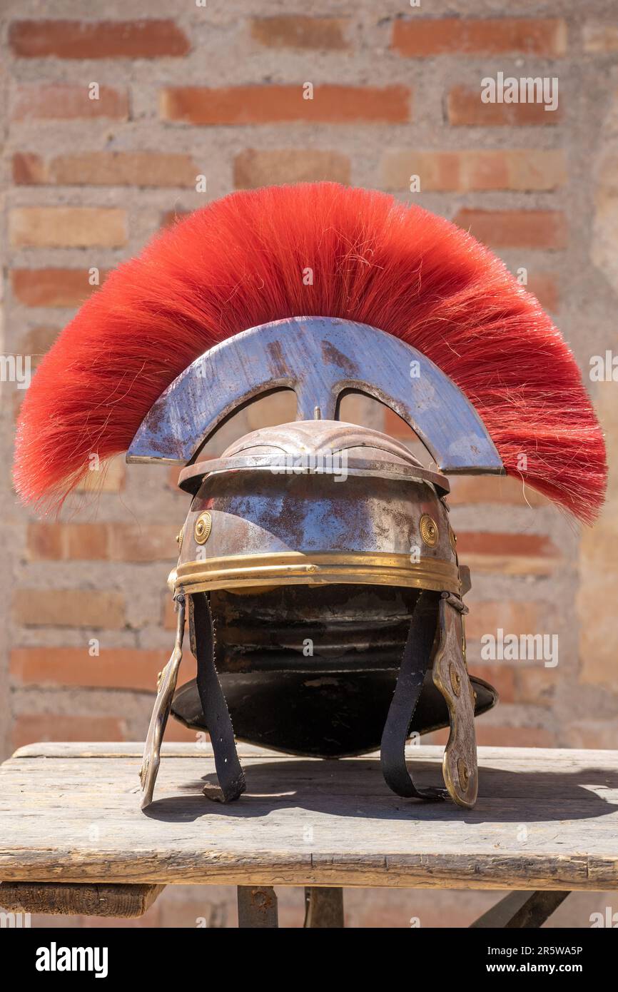 vertical view of a roman centurion helmet with red plume: A Roman ...