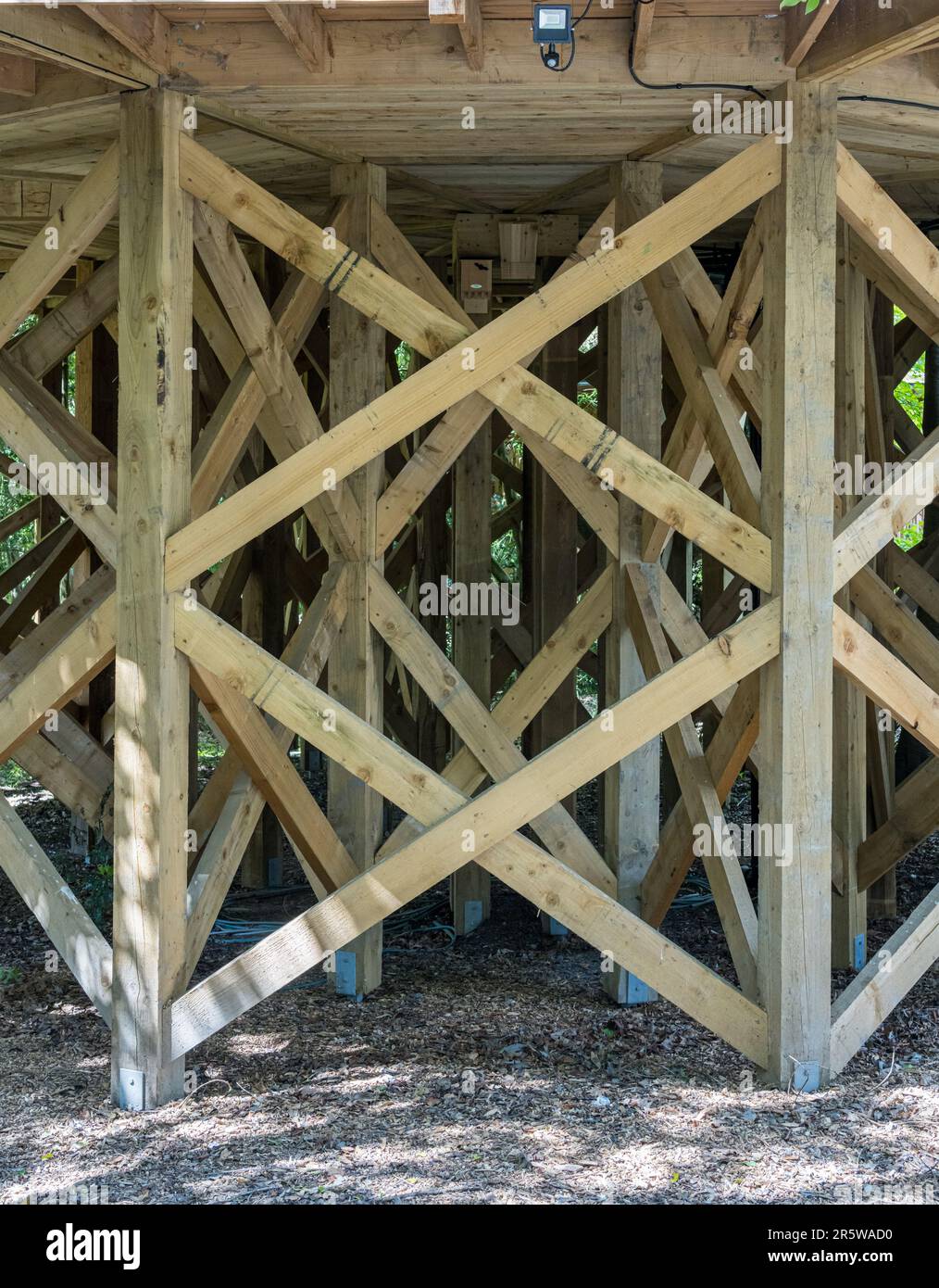 High end camping in tree structure supported by solid wooden piers and ...