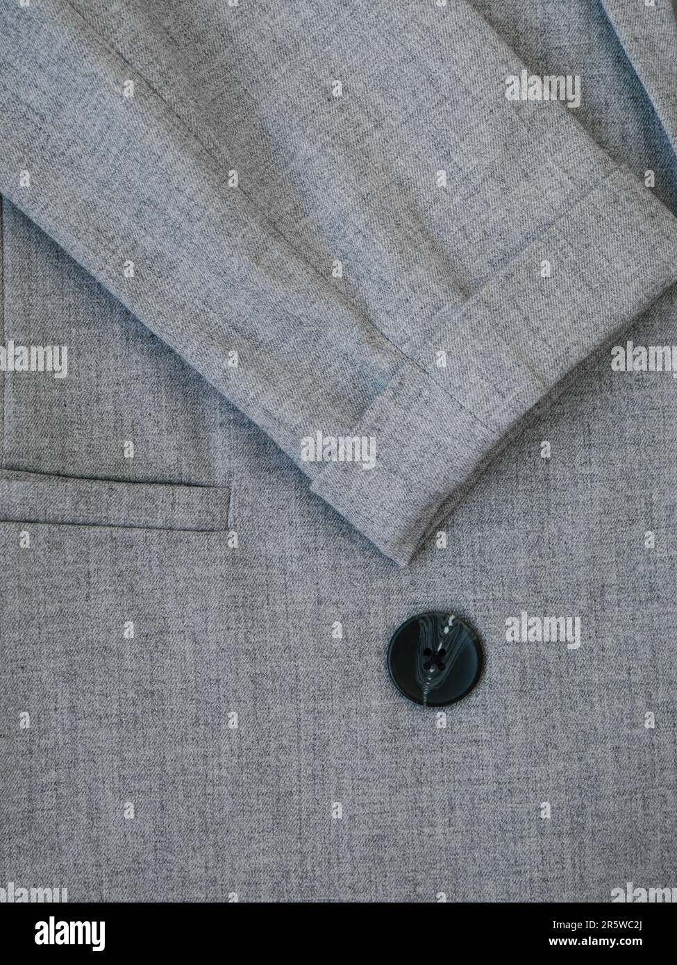Grey women suit jacket with closeup buttons. Business or formal wear ...