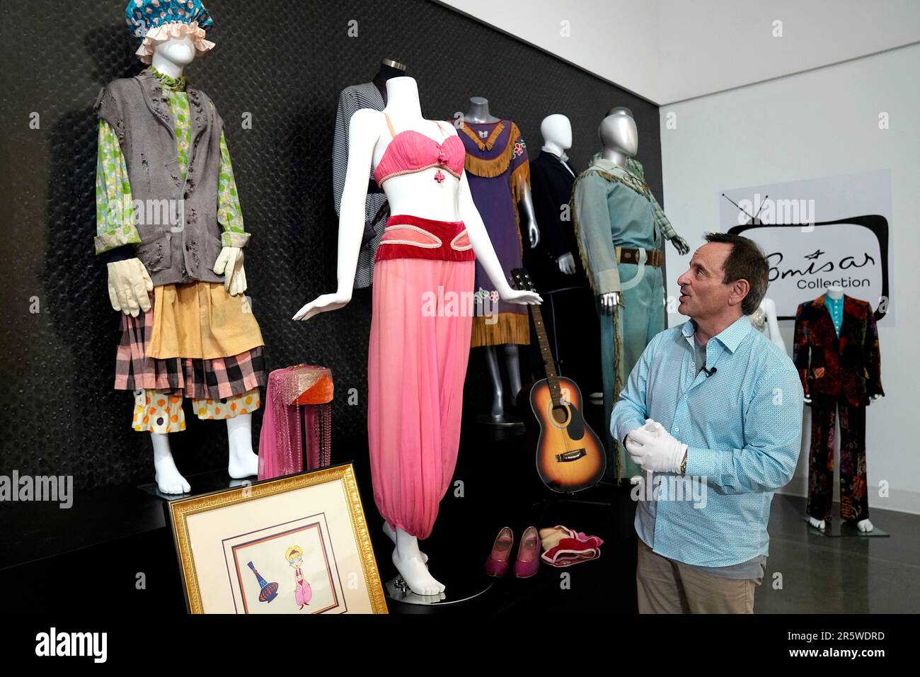 FILE - James Comisar responds to questions during an interview as he ...