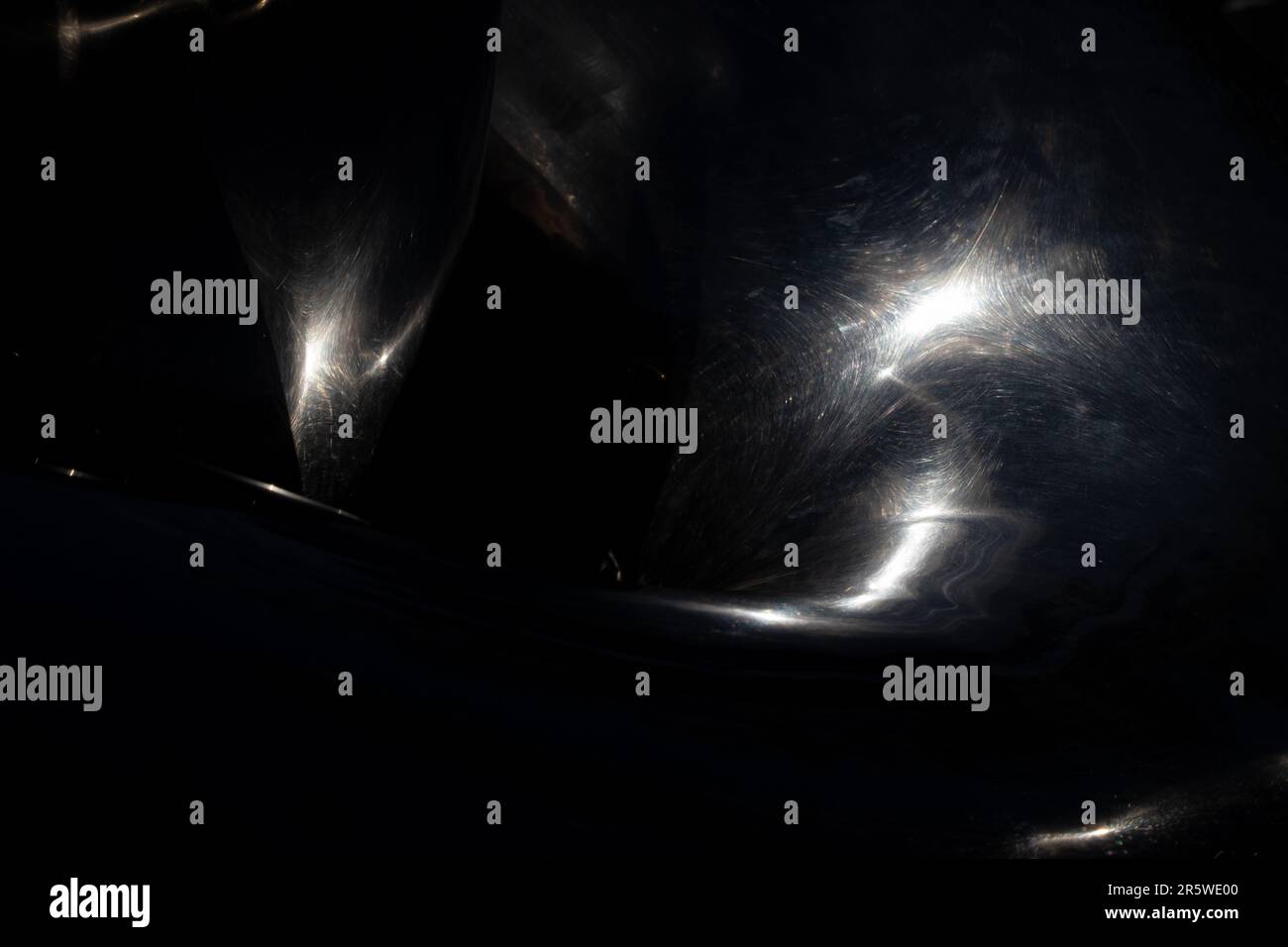 Solar chaotic glare on a black background in mirror reflection, rays of ...