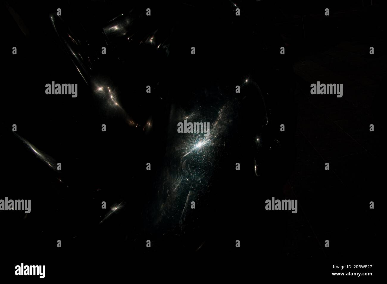 Solar chaotic glare on a black background in mirror reflection, rays of ...