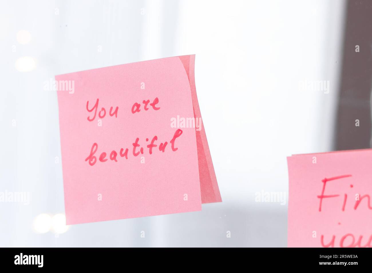 inspirational quotes on pink sticker on the mirror,handwriting text ...