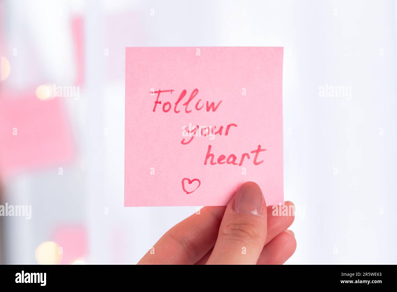 inspirational quotes on pink sticker on the mirror,handwriting text ...