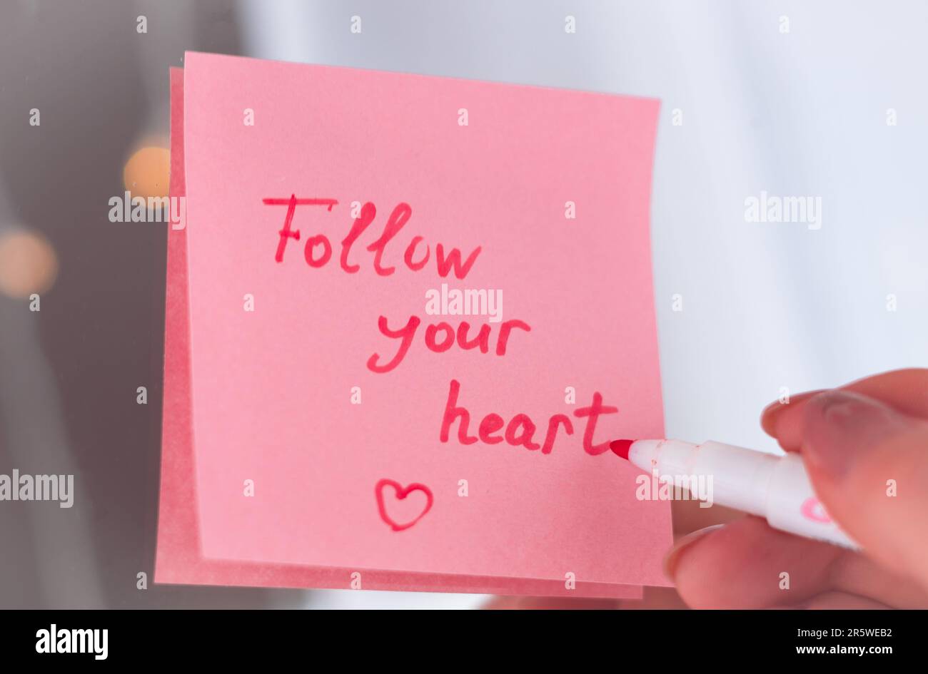 Inspirational quotes on pink sticker hi-res stock photography and ...